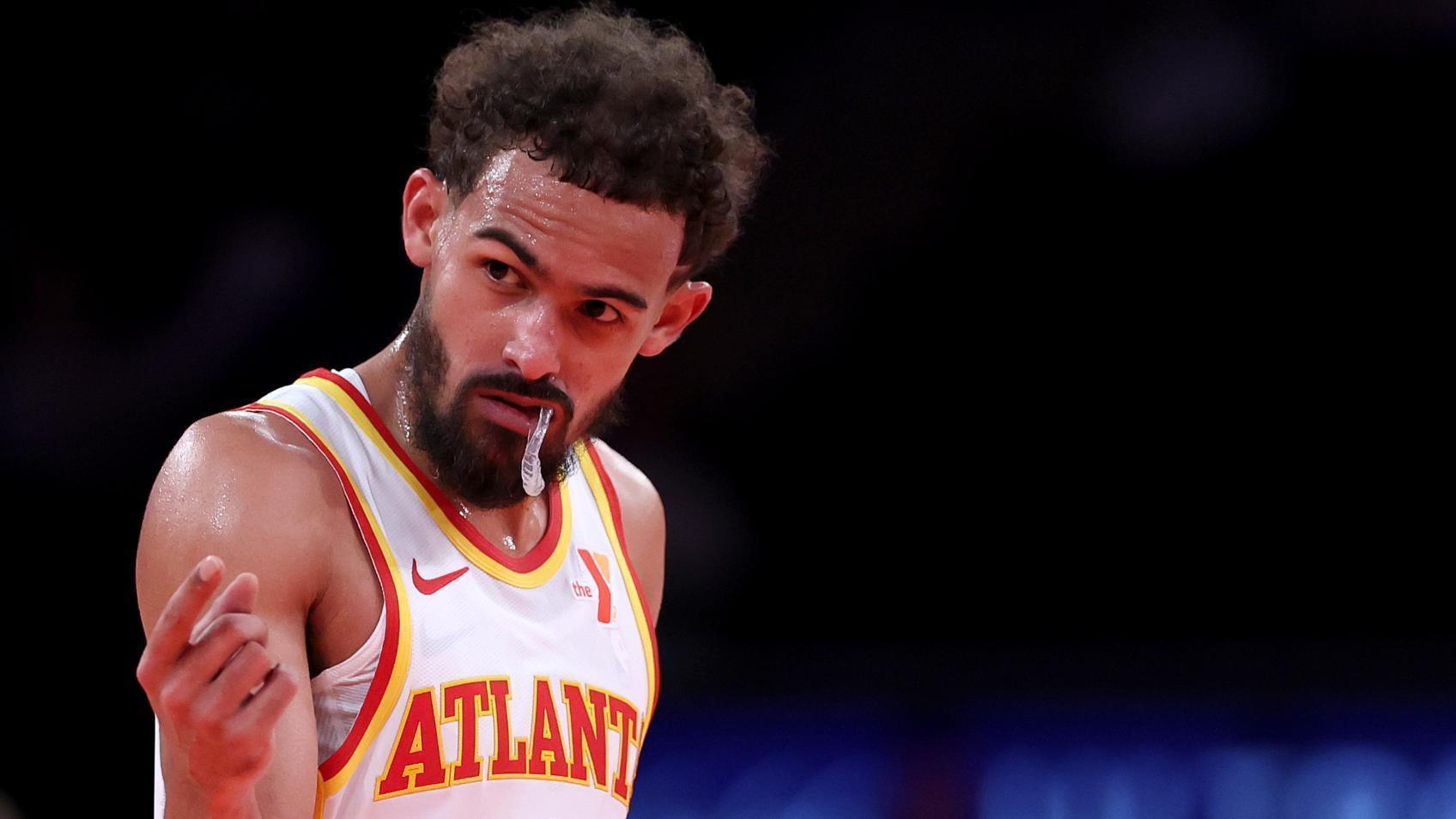 Trae Young trolls Knicks fans by 'rolling the dice' on midcourt logo ...