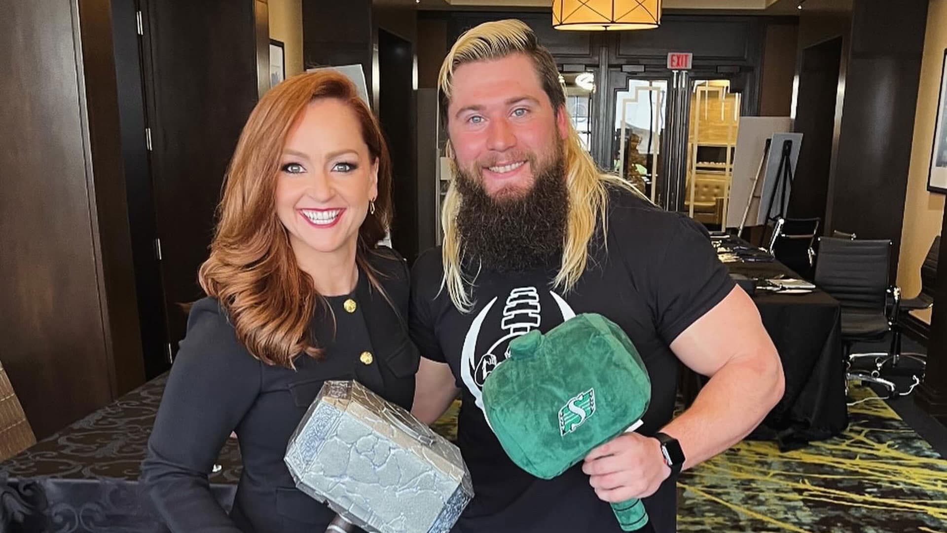 Former Argo Ouellette dons Rider green and receives a special gift from ...